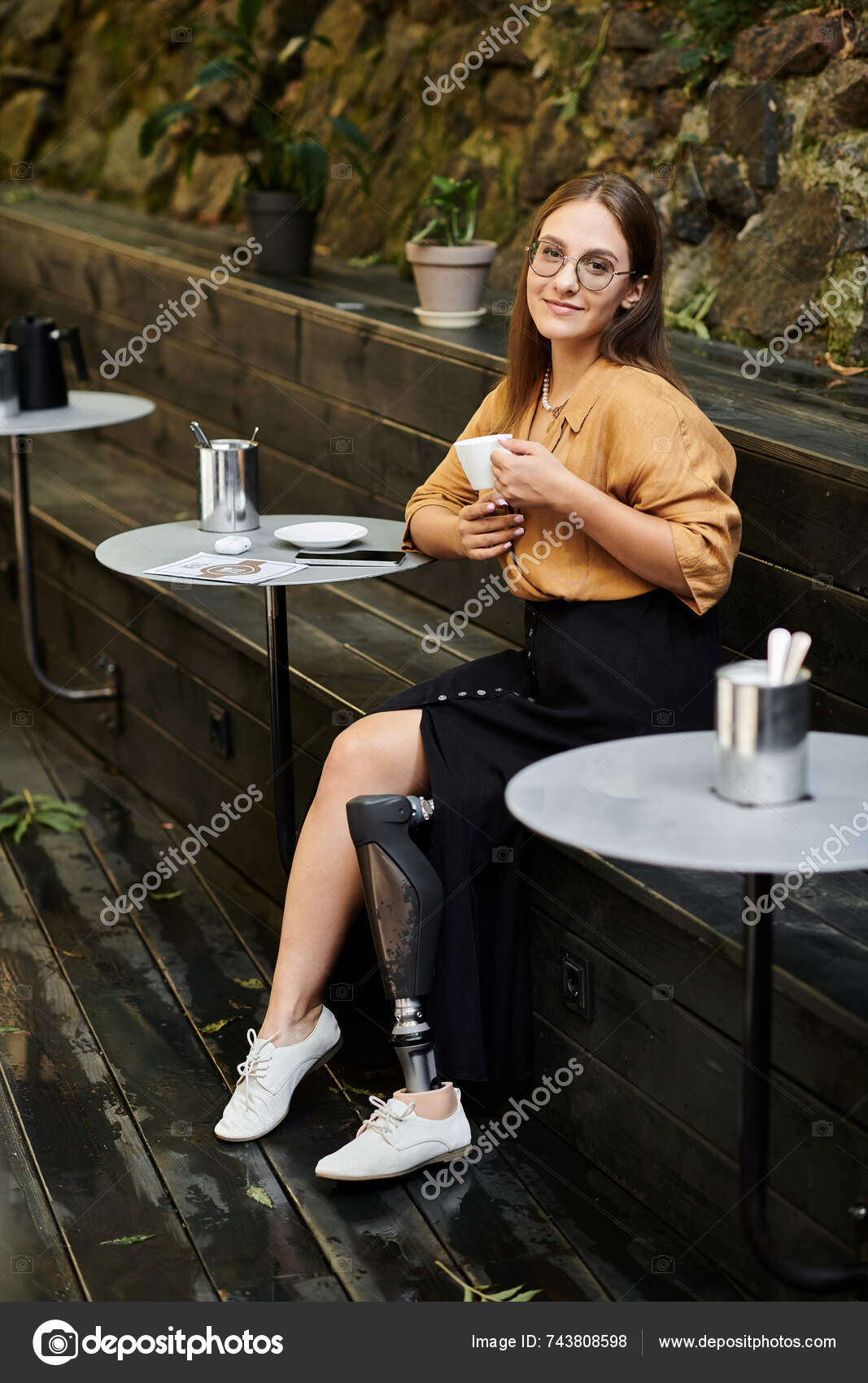 Young Woman Prosthetic Leg Sits Comfortably Cafe Savoring Her Coffee ...