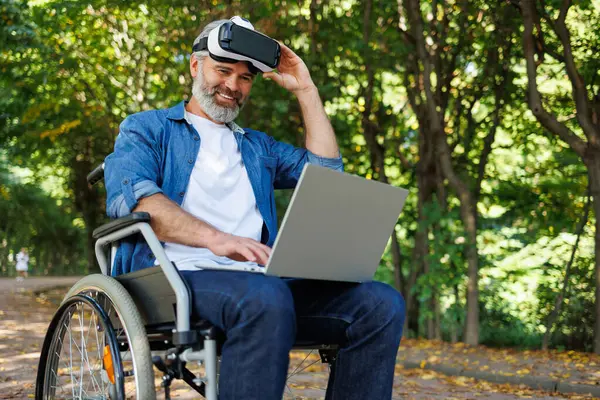 Connected Mobility: Wheelchair User Engaged with AR Interface - Stock ...