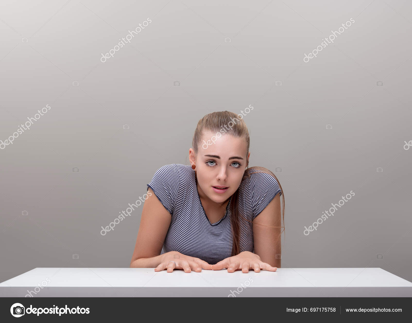 Leaning Forward Her Cautious Gaze Tense Posture Suggest She Bracing ...