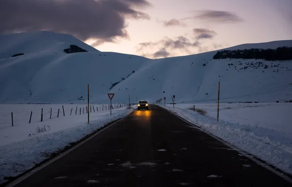 Snowy mountains roads Stock Photos, Royalty Free Snowy mountains roads ...