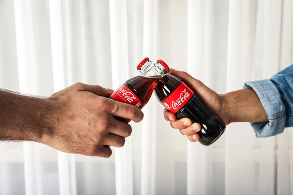 Hand holding the coca cola Stock Photos, Royalty Free Hand holding the ...