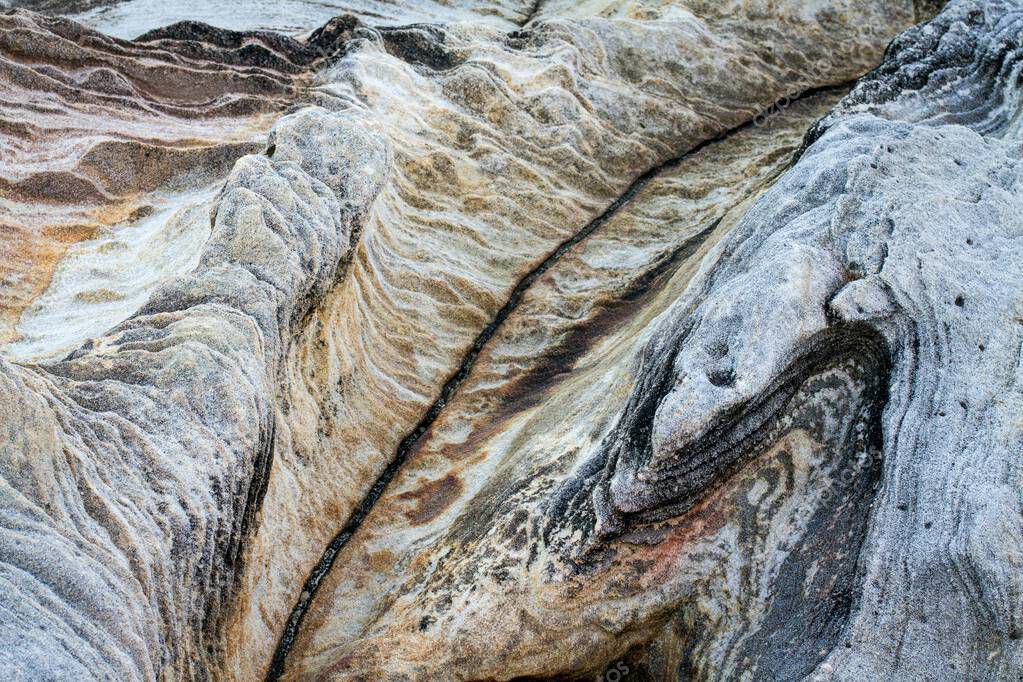 Primer plano de formaciones rocosas con textura dramática en tonos ...