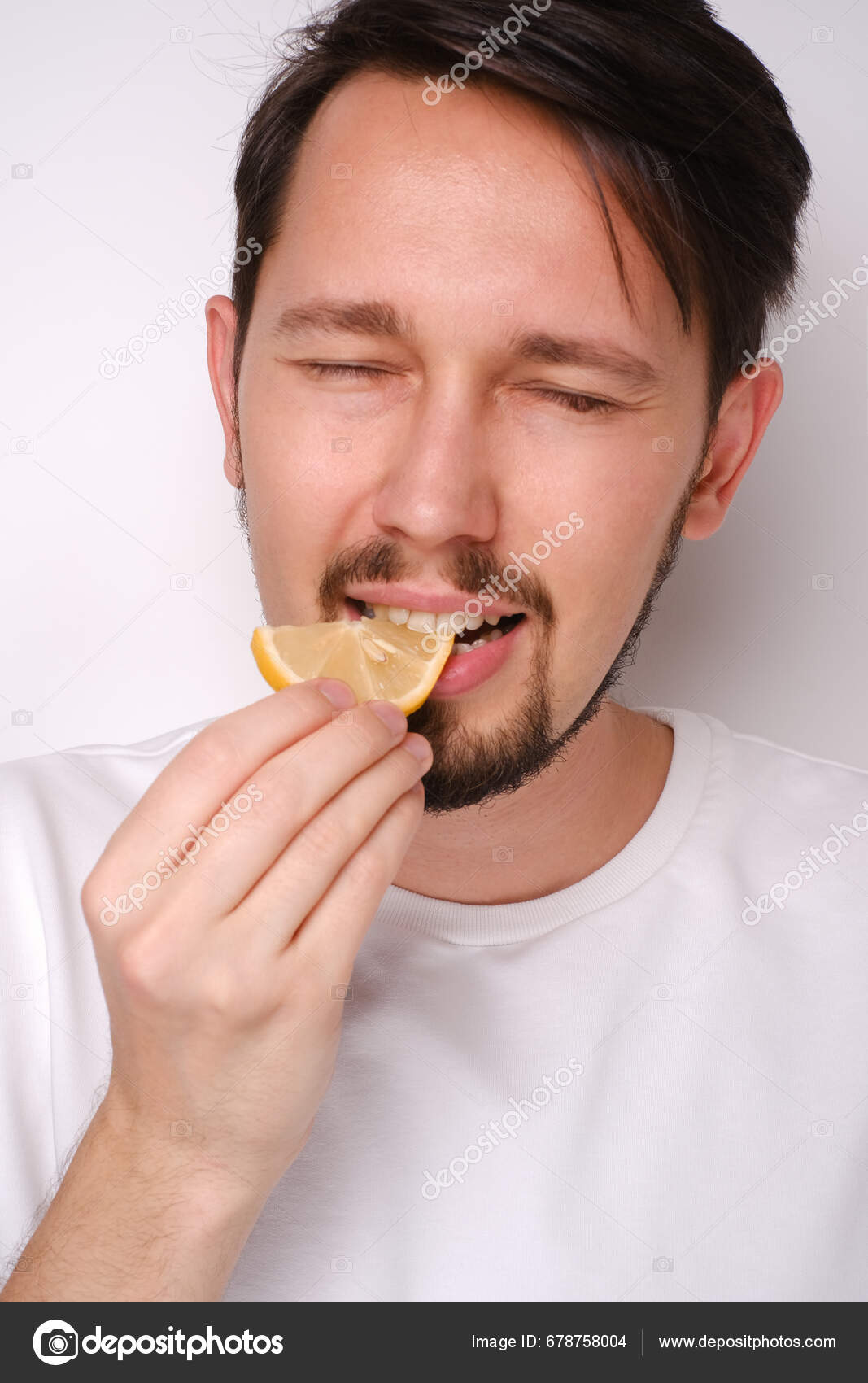 Portrait Man Eating Lemon Wincing Acid — Stock Photo © ruseyskiy #678758004