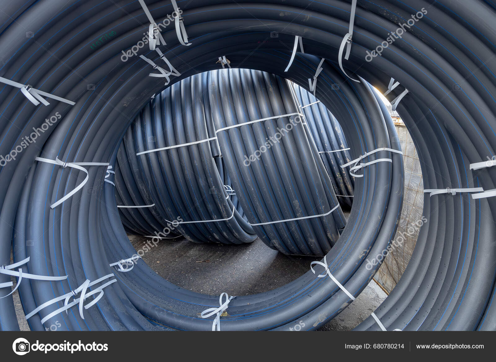 Several Rolled Small Diameter Polyethylene Pipes Laying High Voltage ...