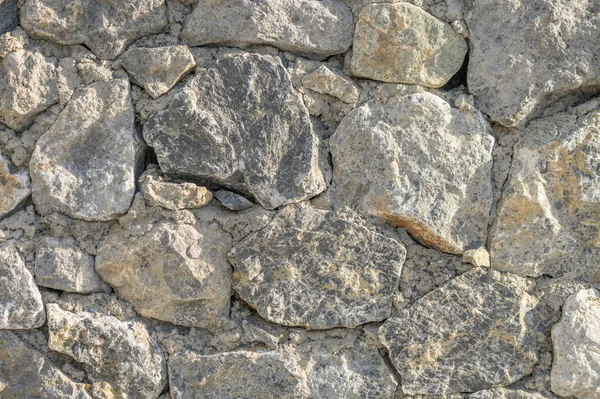Small stone wall texture Stock Photos, Royalty Free Small stone wall ...