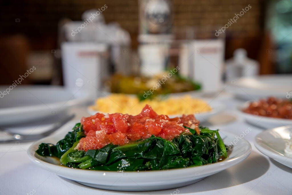 Traditional Anatolian appetizers, raki table. Red bean stew, carrot ...
