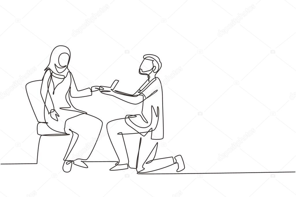 Continuo dibujo de una línea hombre árabe hace mujer propuesta de ... Continuo dibujo de una línea hombre árabe hace mujer propuesta de ...