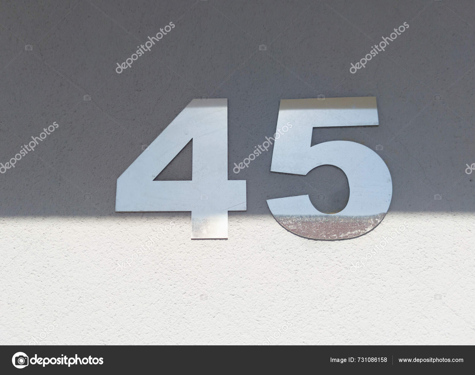 House Number Silver Grey Wall — Stock Photo © WHPics #731086158