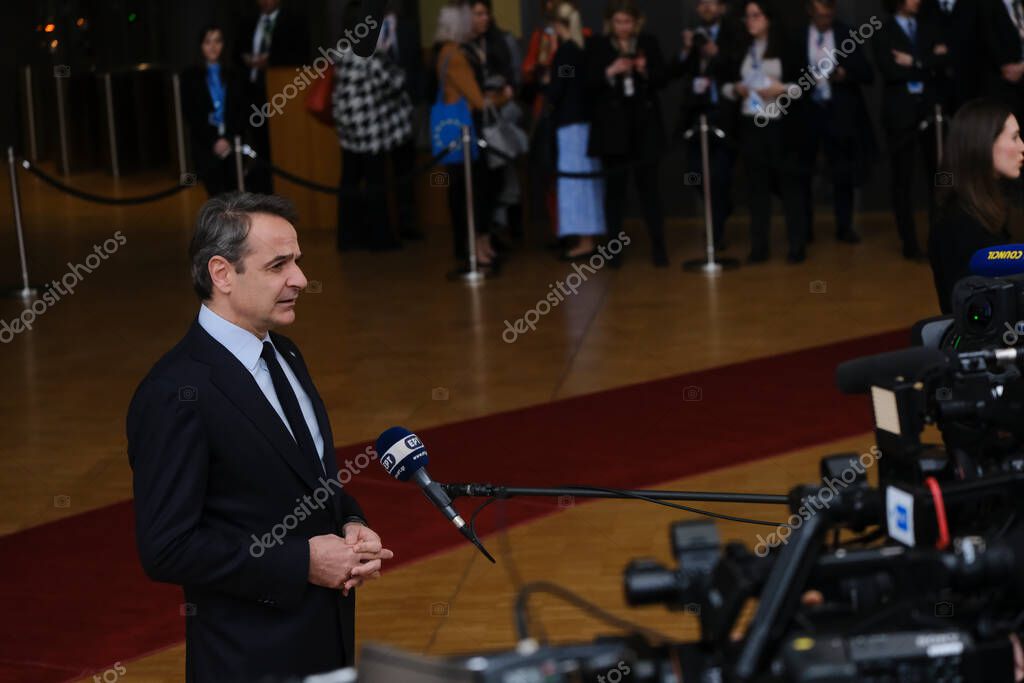 Greece's Prime Minister Kyriakos Mitsotakis arrives for a EU Summit, at ...