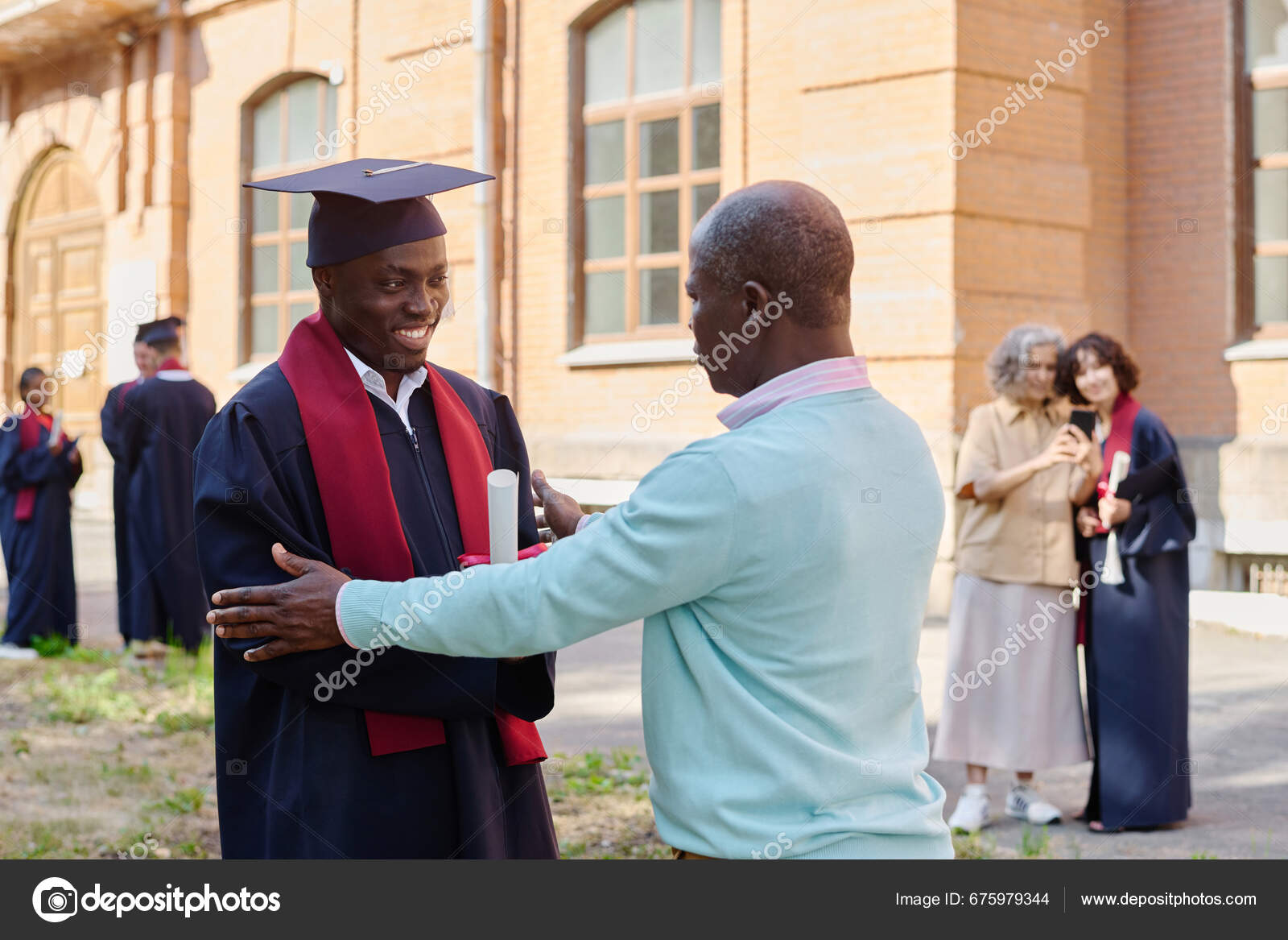 Dad Congratulating His Son Graduation University While Standing ...