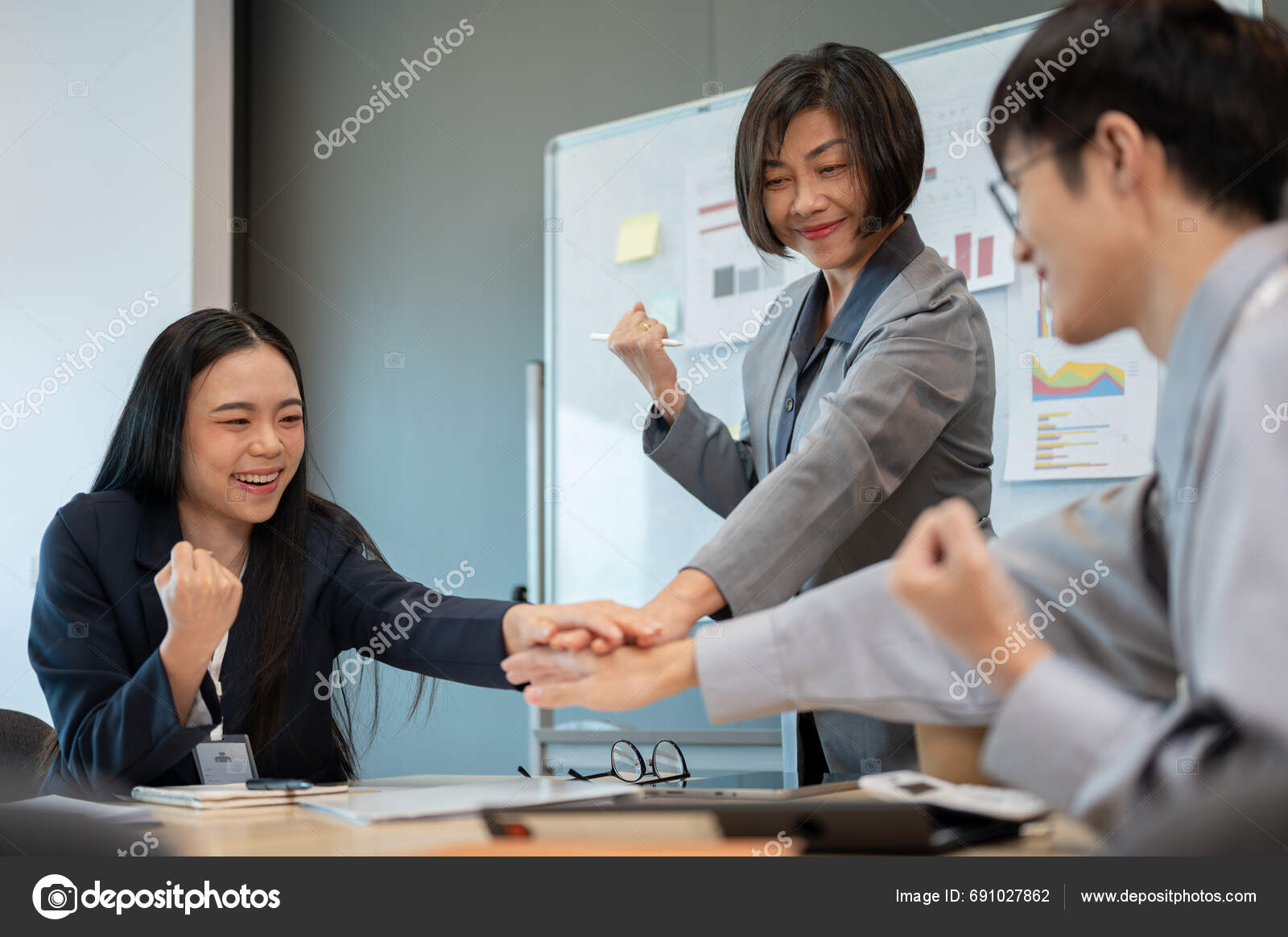 Group Diverse Businesspeople Putting Hands Together Meeting Table ...