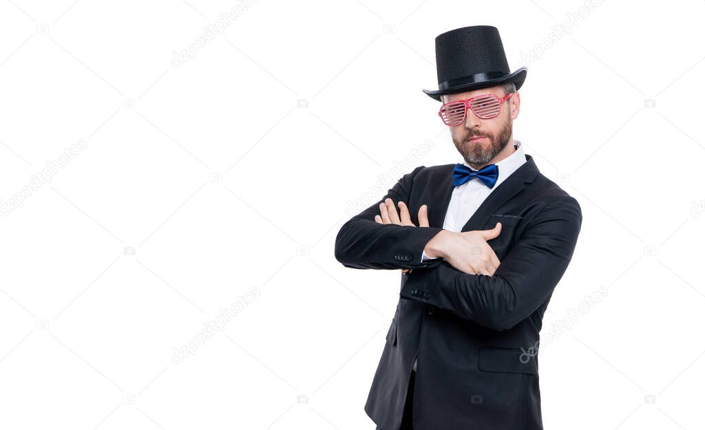 partygoer showman wear tuxedo in studio with copy space. showman ...