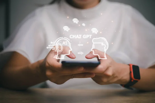 ChatGPT Chat with AI or Artificial Intelligence. woman chatting with a ...