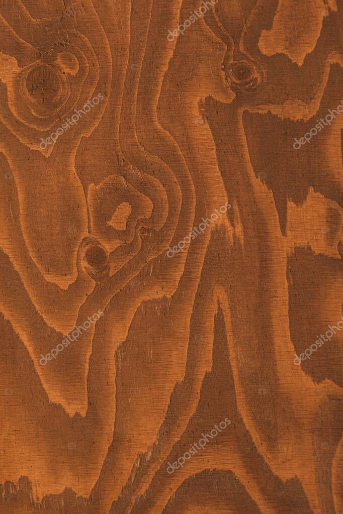 La imagen captura los tonos ricos y cálidos y los patrones de grano ...