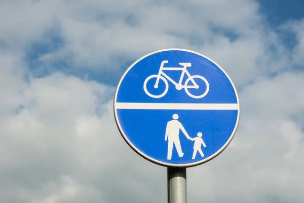 Cyclist and pedestrian route sharing sign. Road sign Pedestrian and ...