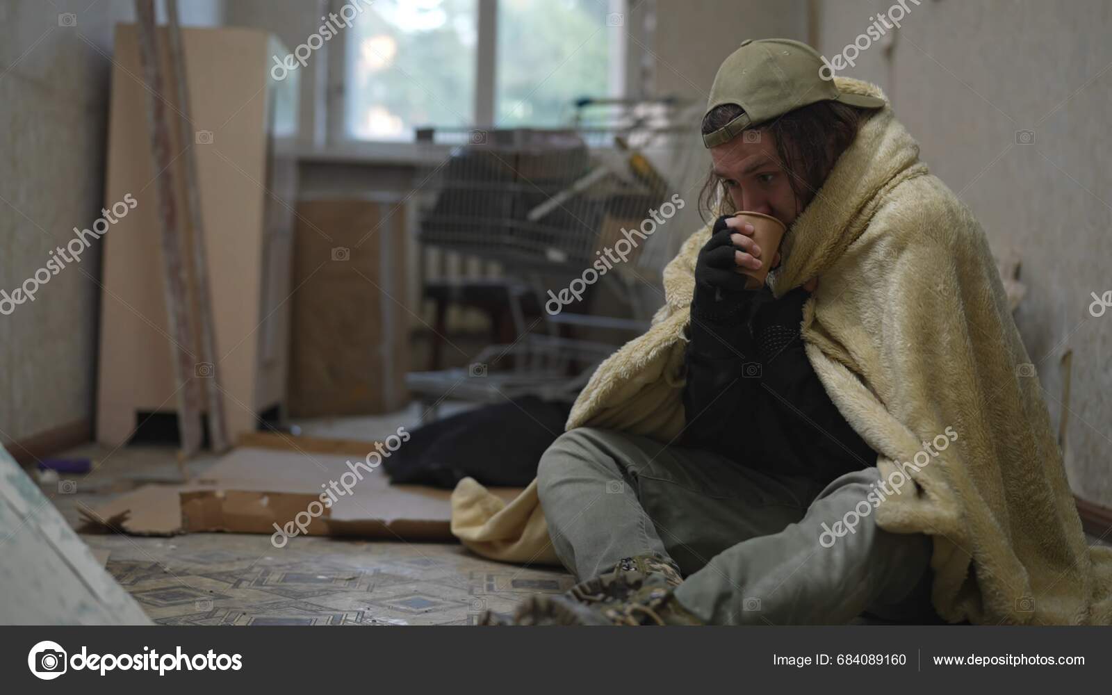 Homeless Poor Man Sitting Room Abandoned Building Trying Keep Warm ...