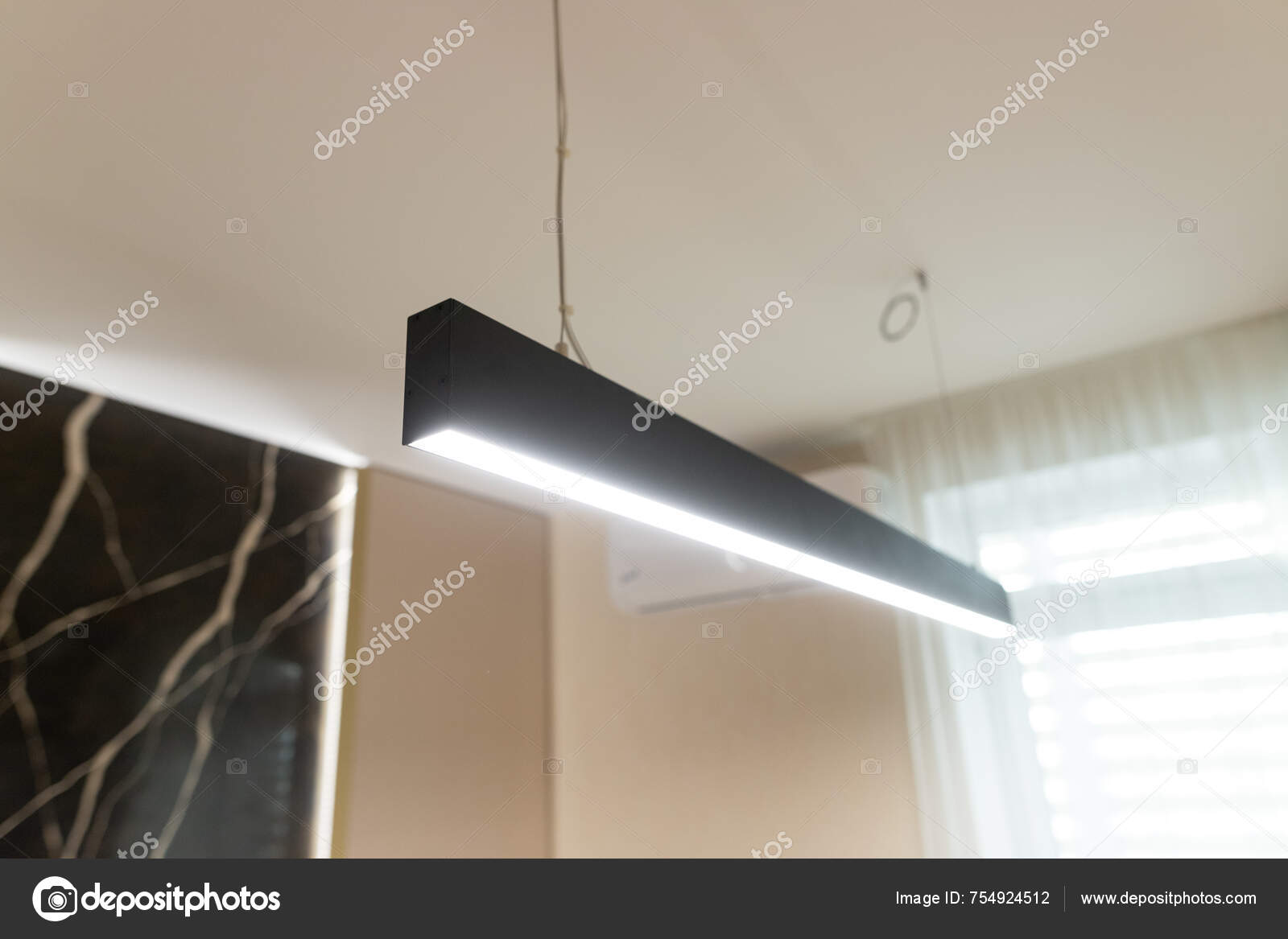 Modern Interior Design Featuring Sleek Suspended Lighting Elegantly ...