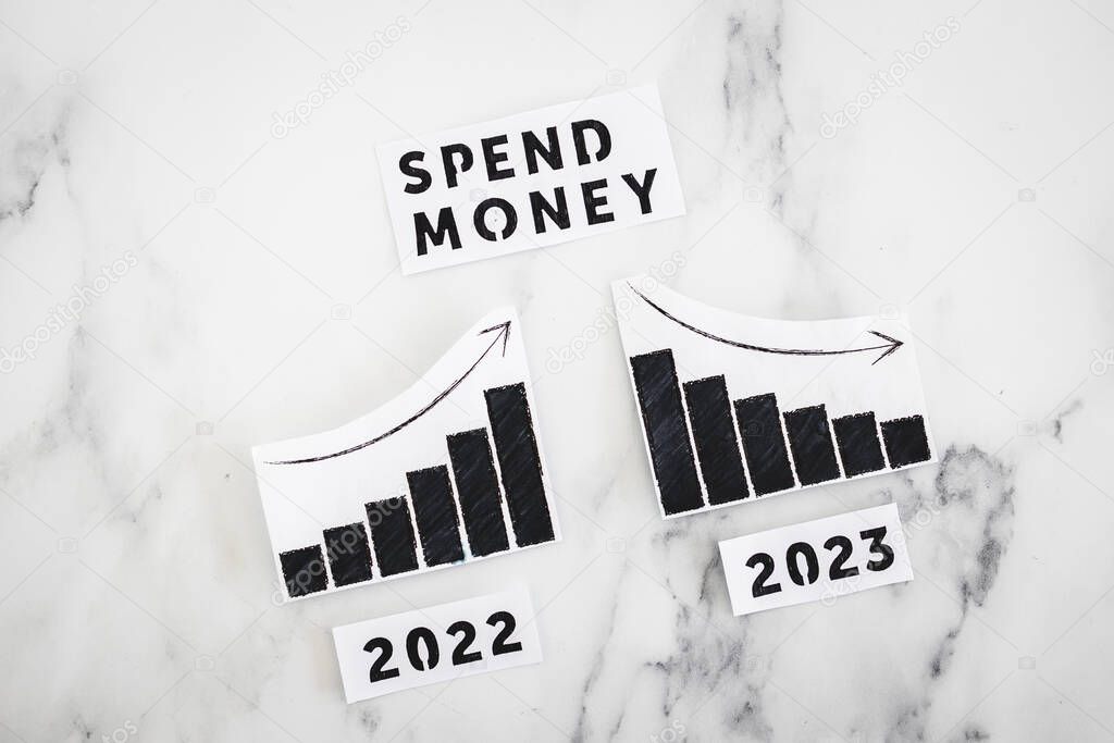 spend money text with 2022 chart showing stats increasing and 2023 ...