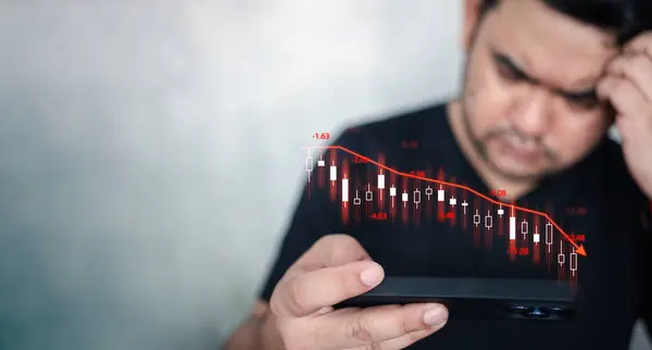 Frustrated investor. Man trader grabs head. Bankrupt businessman ...