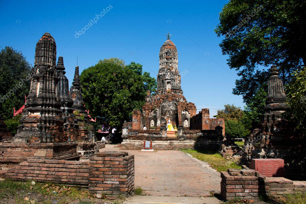 Ancient antique buddha statue and ruins old chedi stupa for thai people ...