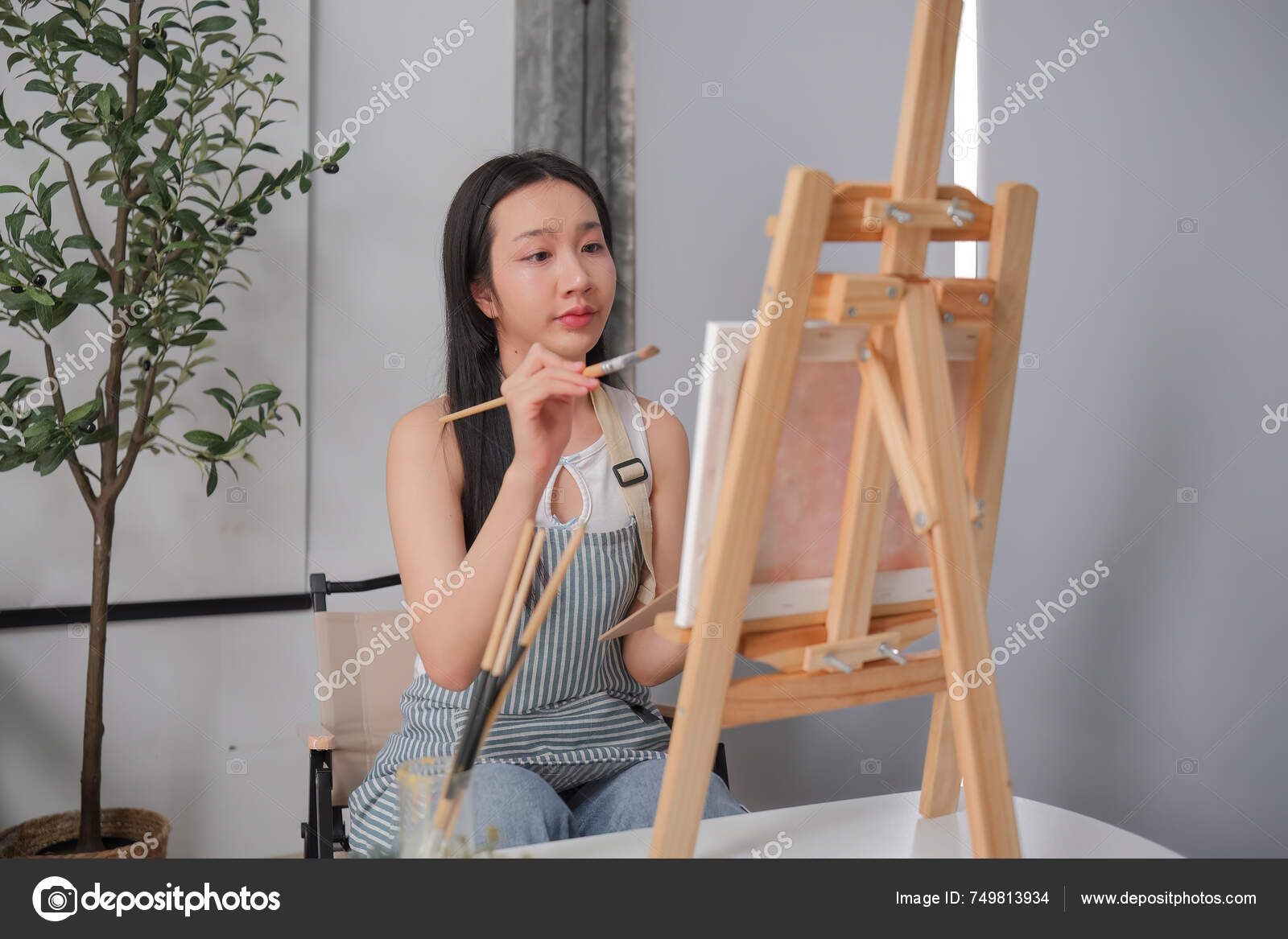 Young Woman Enjoys Relaxing Moment Drawing Picture Modern Minimalist ...