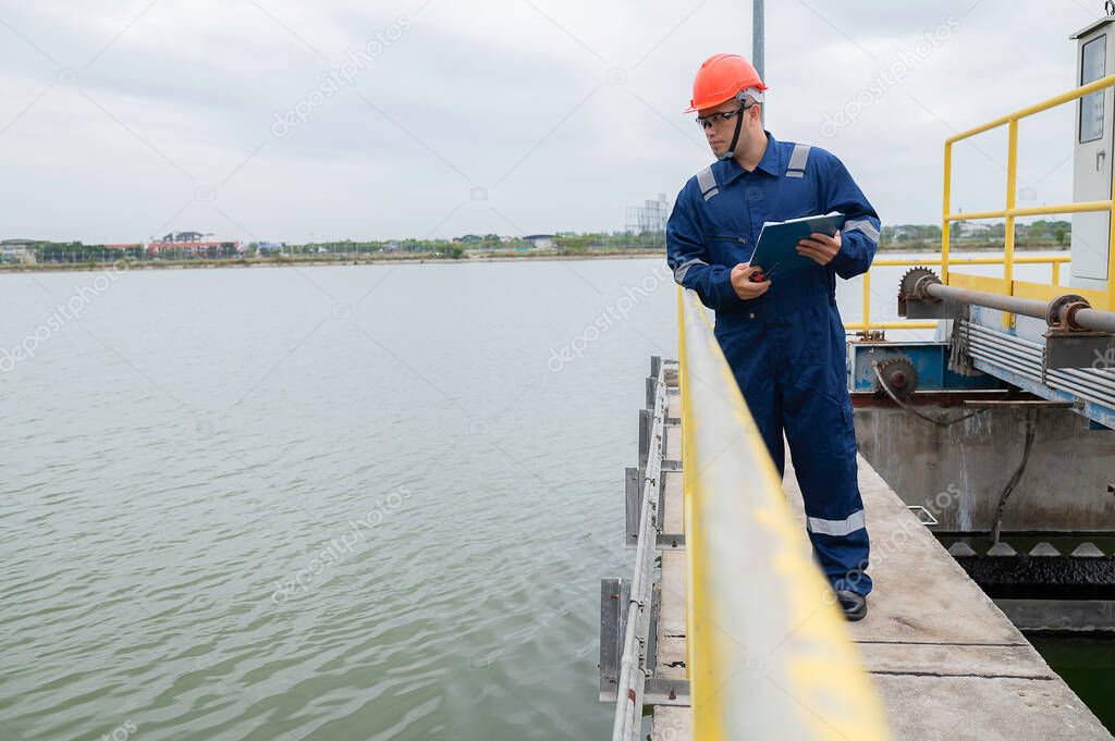 Water plant maintenance technicians, mechanical engineers check the ...