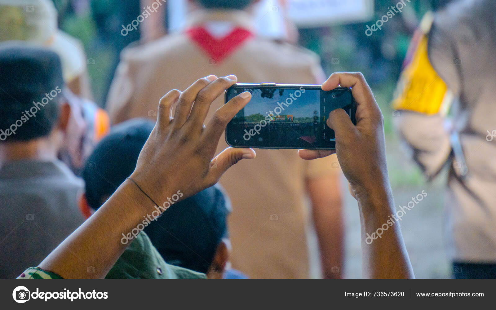 People Recording Smartphone — Stock Editorial Photo © mangkelin1 #736573620