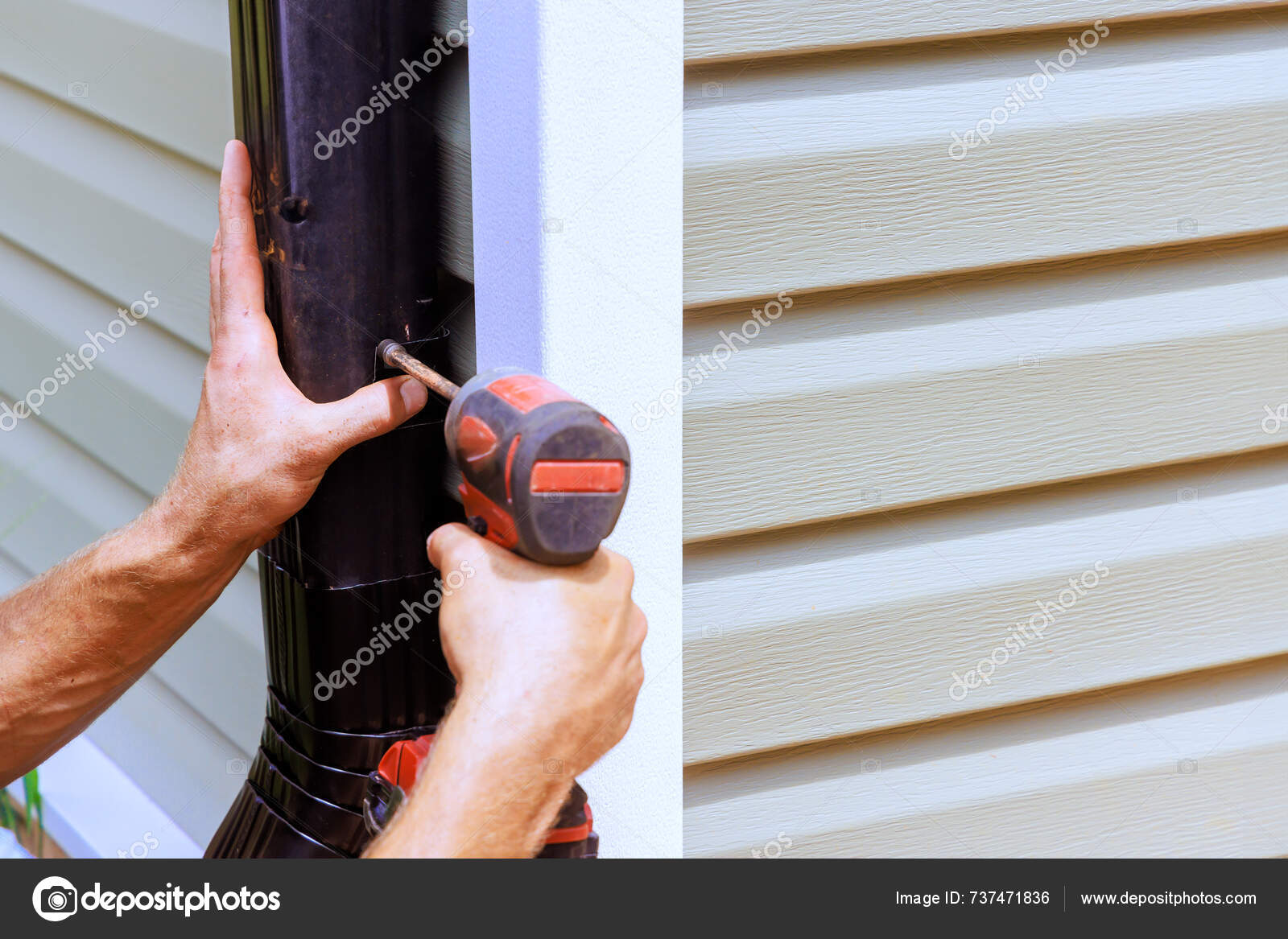 Employee Installing Rain Gutter Roof Installing Downpipe Downspout Bend ...