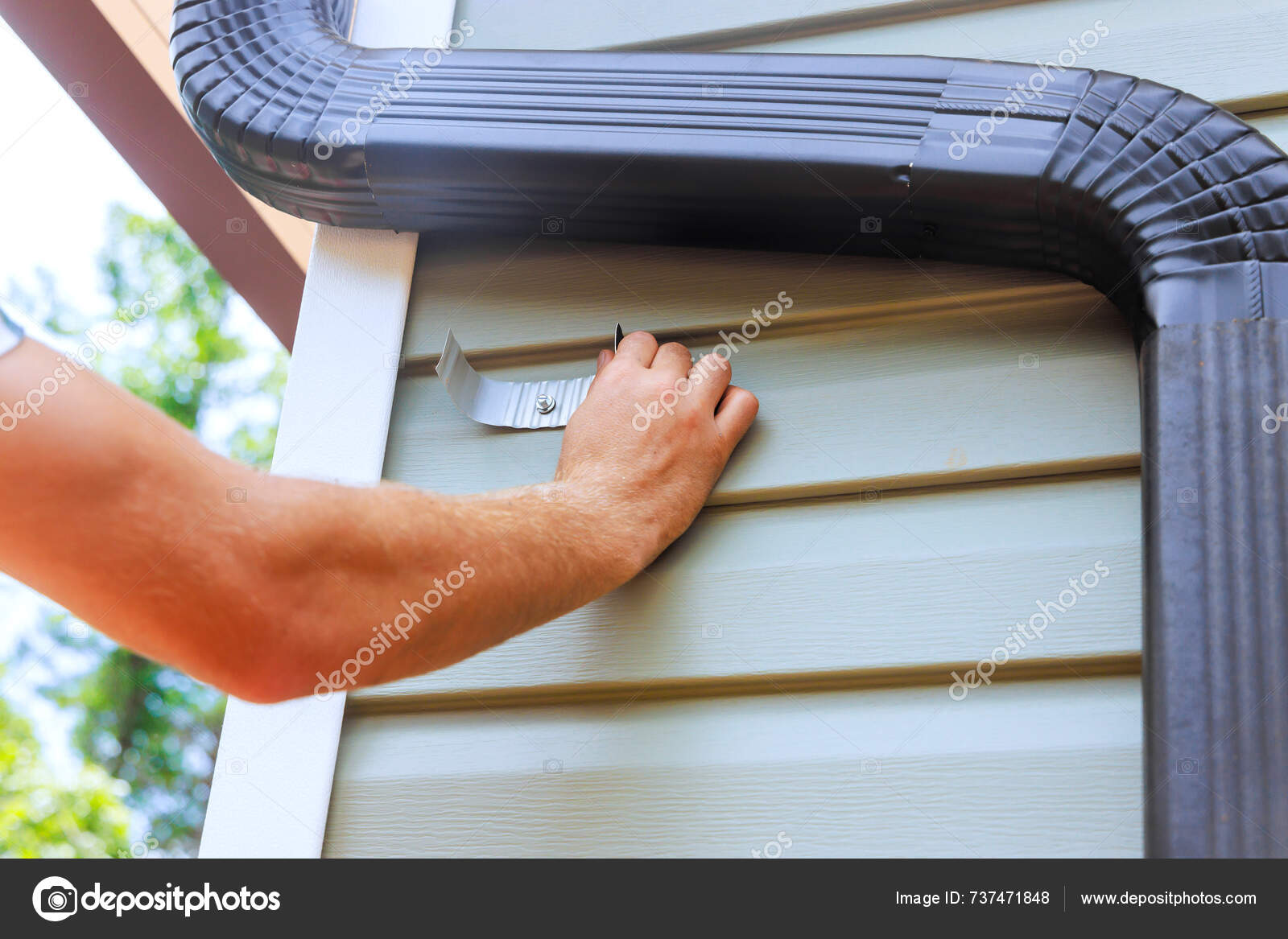 Worker Installing Rain Gutter Roof Fitting Downpipe Bending Downspout ...