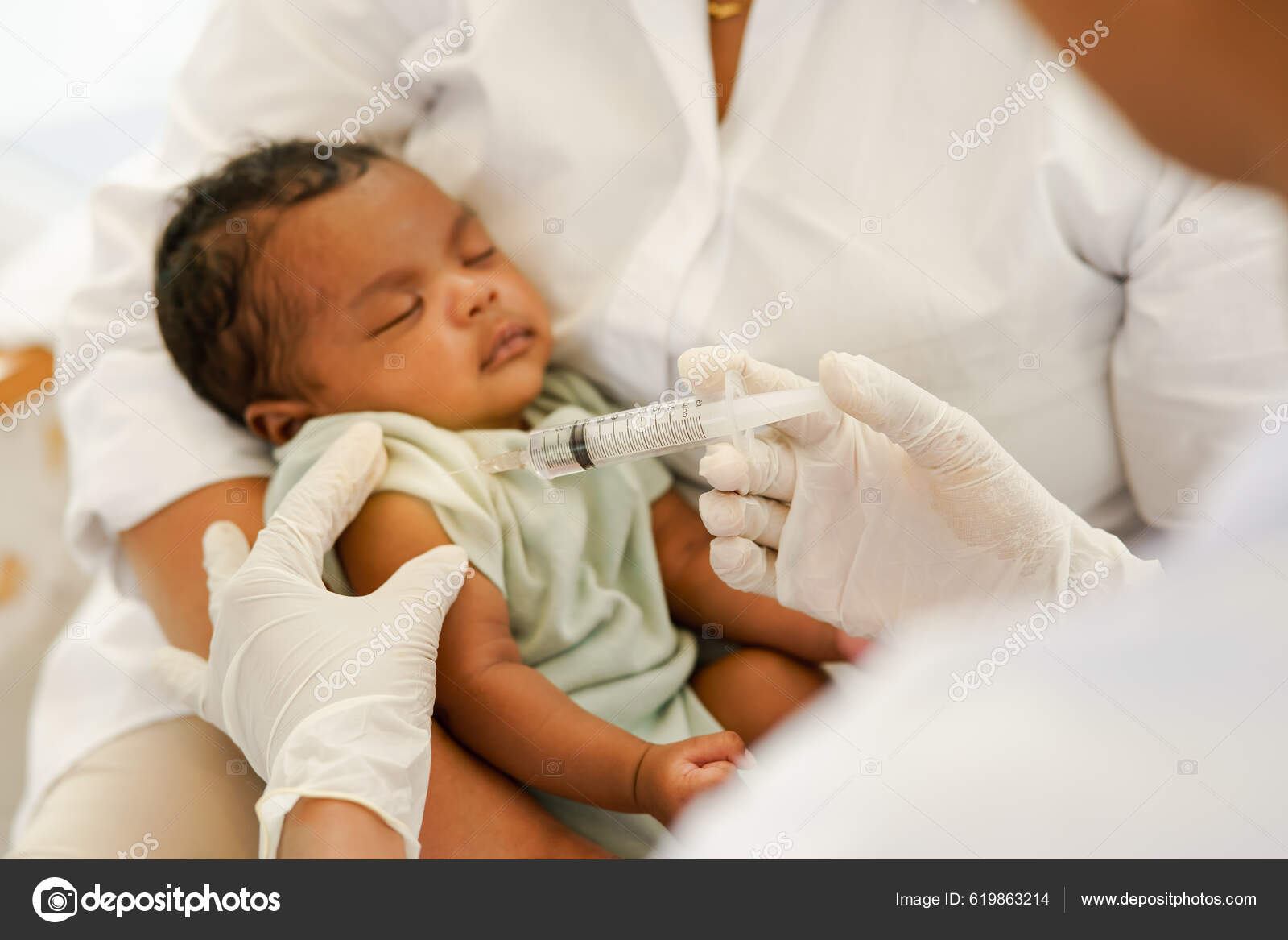 Close Hand Needle Doctor Holds Syringe Vaccinate Newborn Baby One ...