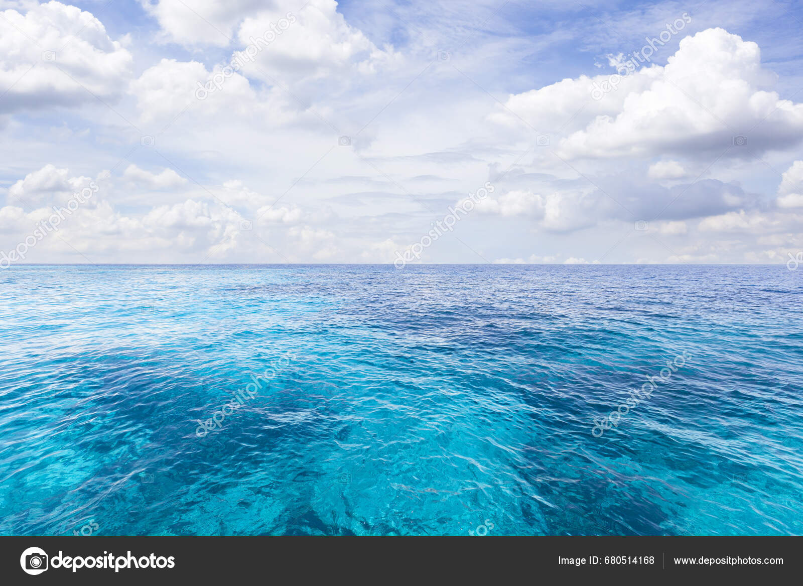 Beautiful Vibrant Blue Ocean Cloudy Blue Sky — Stock Photo © gamjai ...