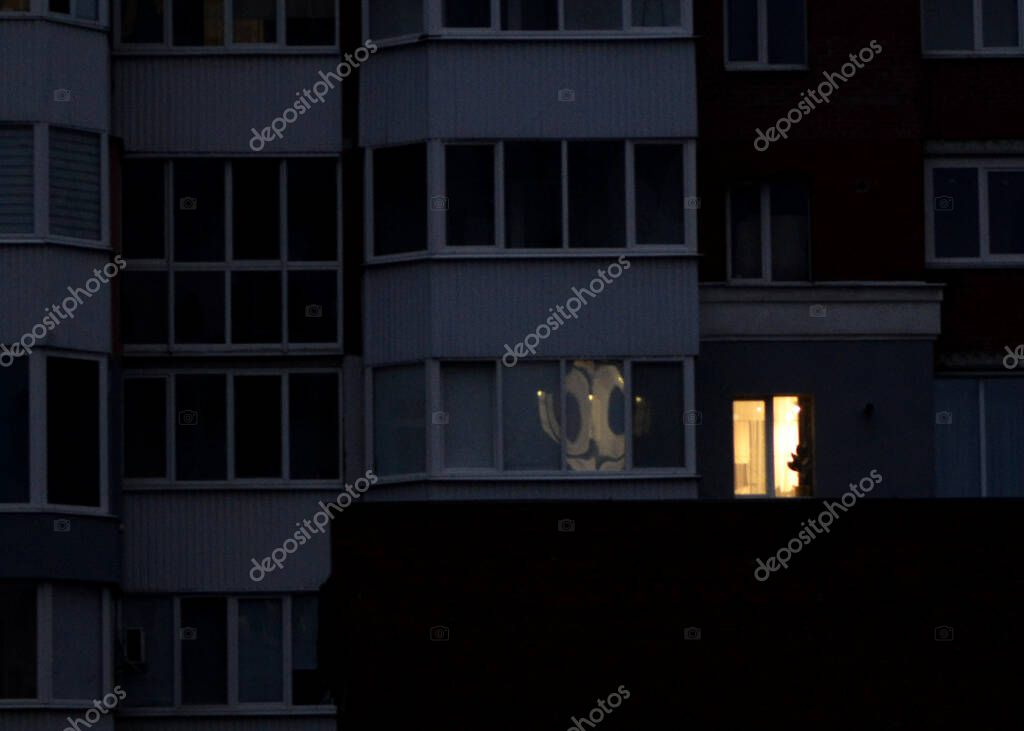 We see a strange image in the window of the house, apparently due to ...