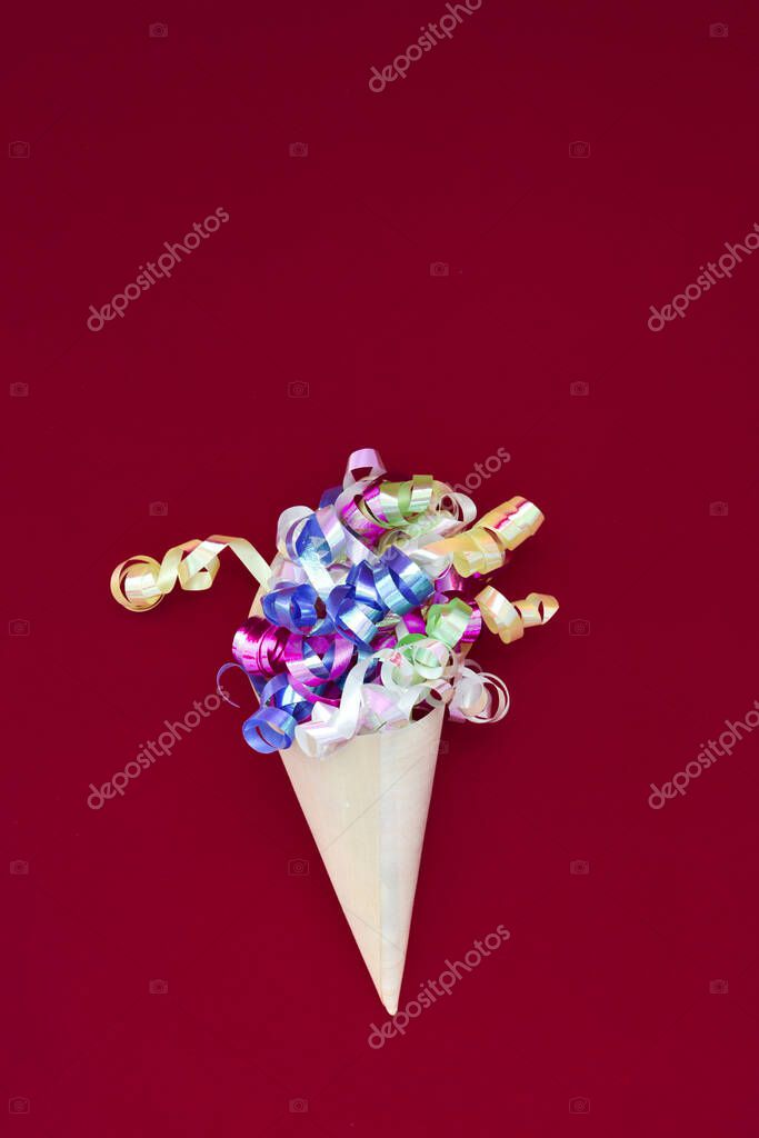 Paper cone with colorful party streamers Viva Magenta colored ...