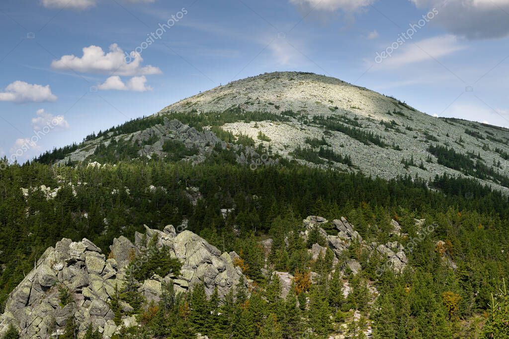Mountain landscape with light grey rounded rocky, stony mountain peak ...