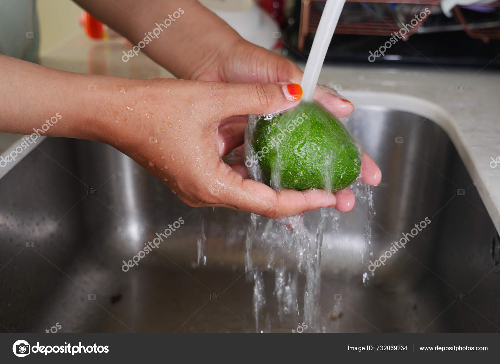 Hand Washing Avocado Water Sprinkling — Stock Photo © Towifqu #732069234