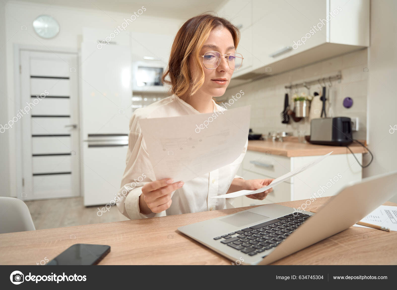Concentrated Lady Sitting Kitchen Table Bills Hands Staring Laptop ...