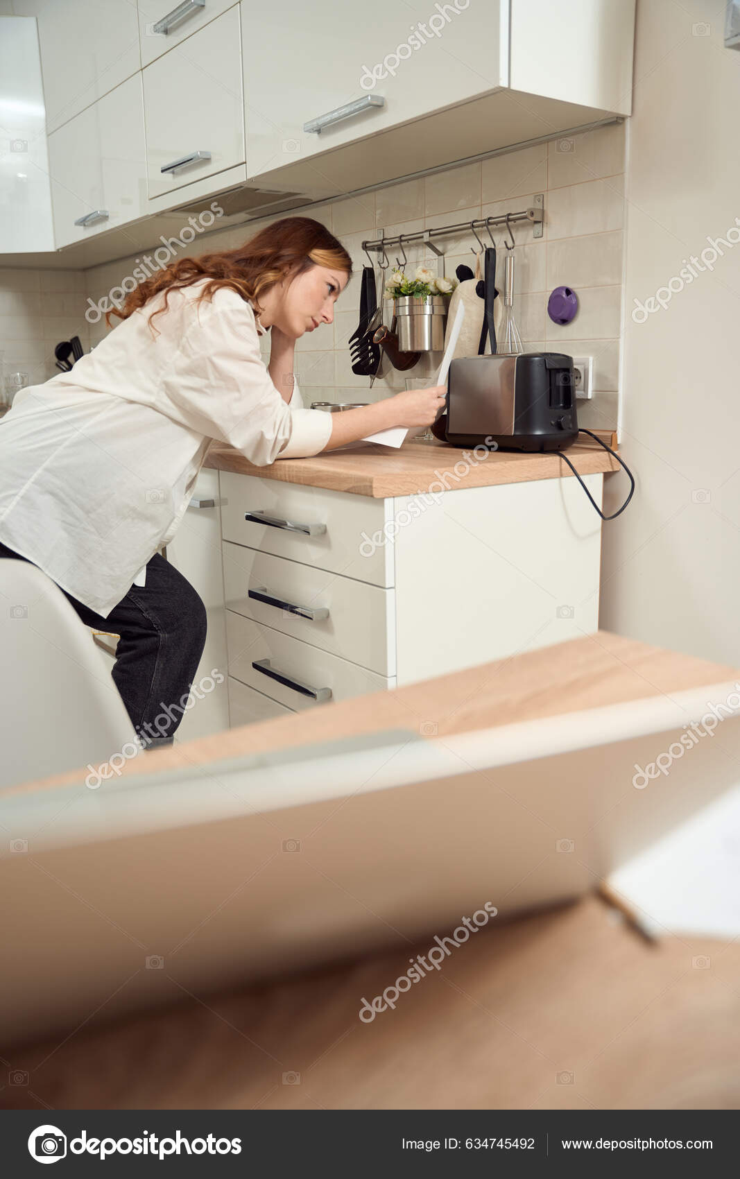 Lady Leaning On Counetr