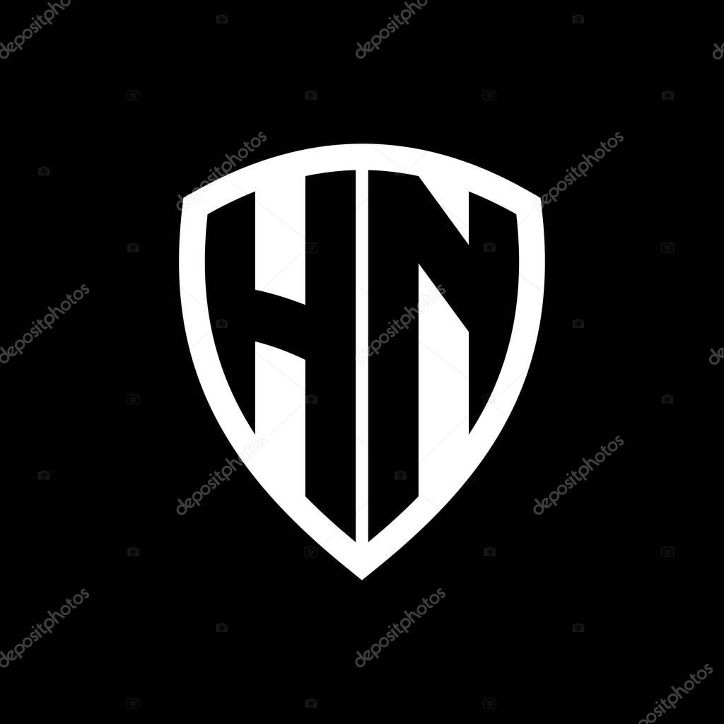 Logo monograma HN con forma de escudo de letras en negrita con plantilla de diseño de color ...