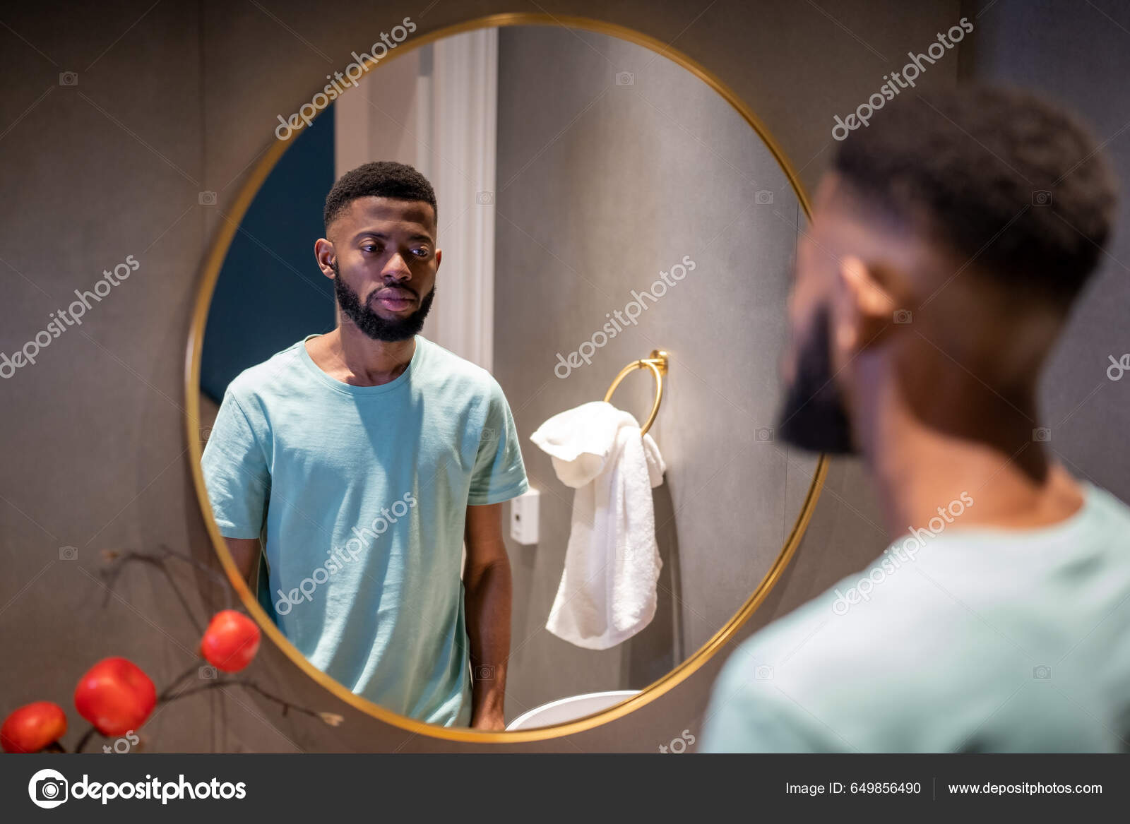 Man Looking In Mirror Sad
