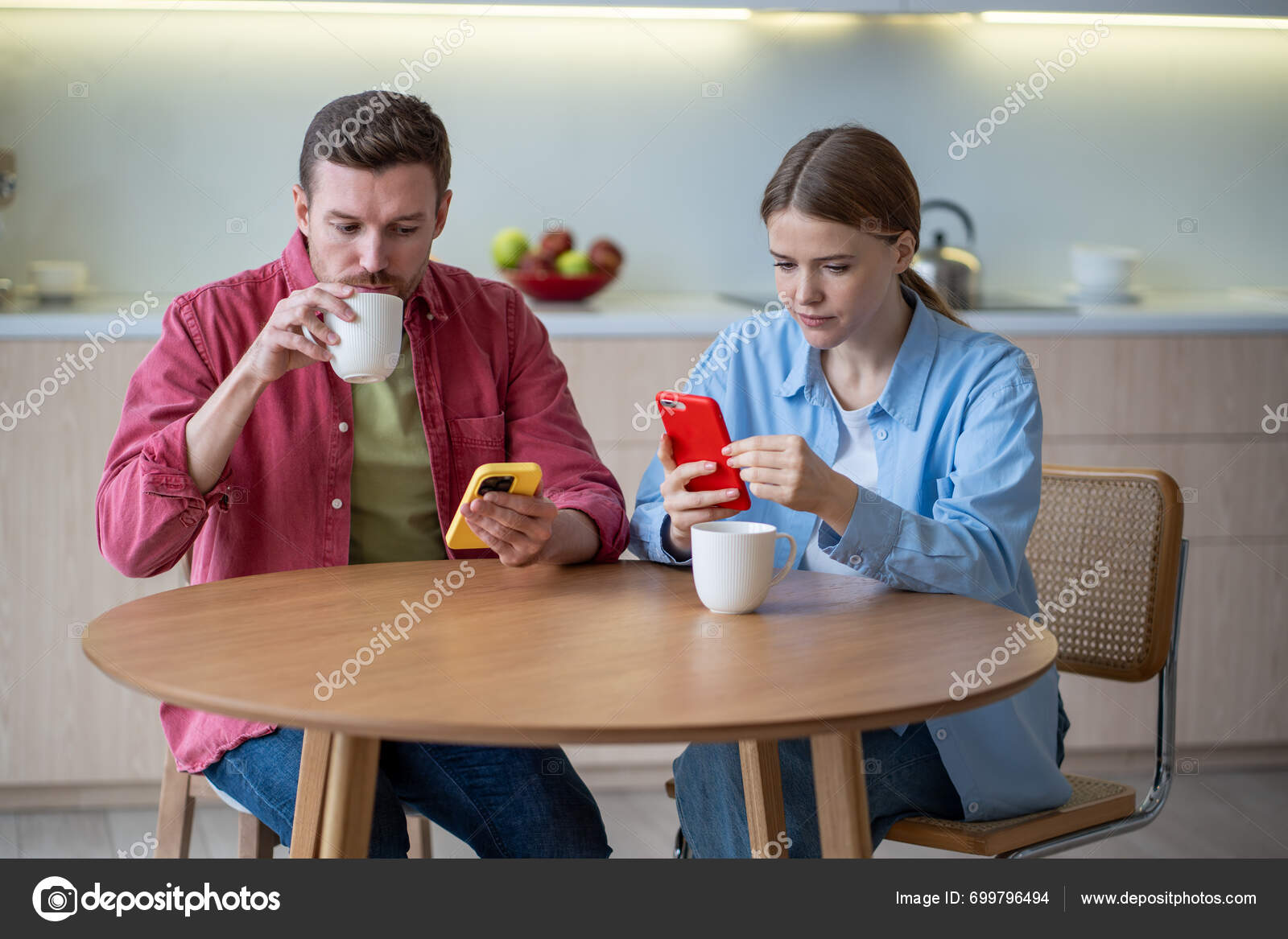 Pensive Couple Obsessed Smartphones Sitting Kitchen Drinking Tea ...