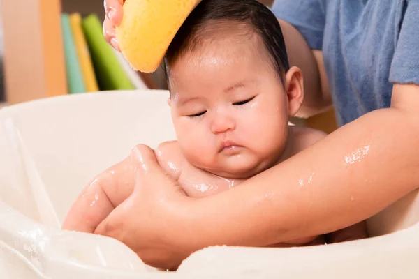 Asian baby bath Stock Photos, Royalty Free Asian baby bath Images ...