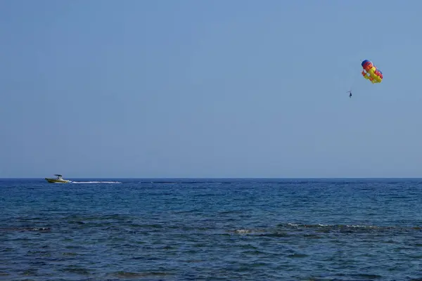 Parasailing on the Mediterranean Sea. Parasailing, parascending ...