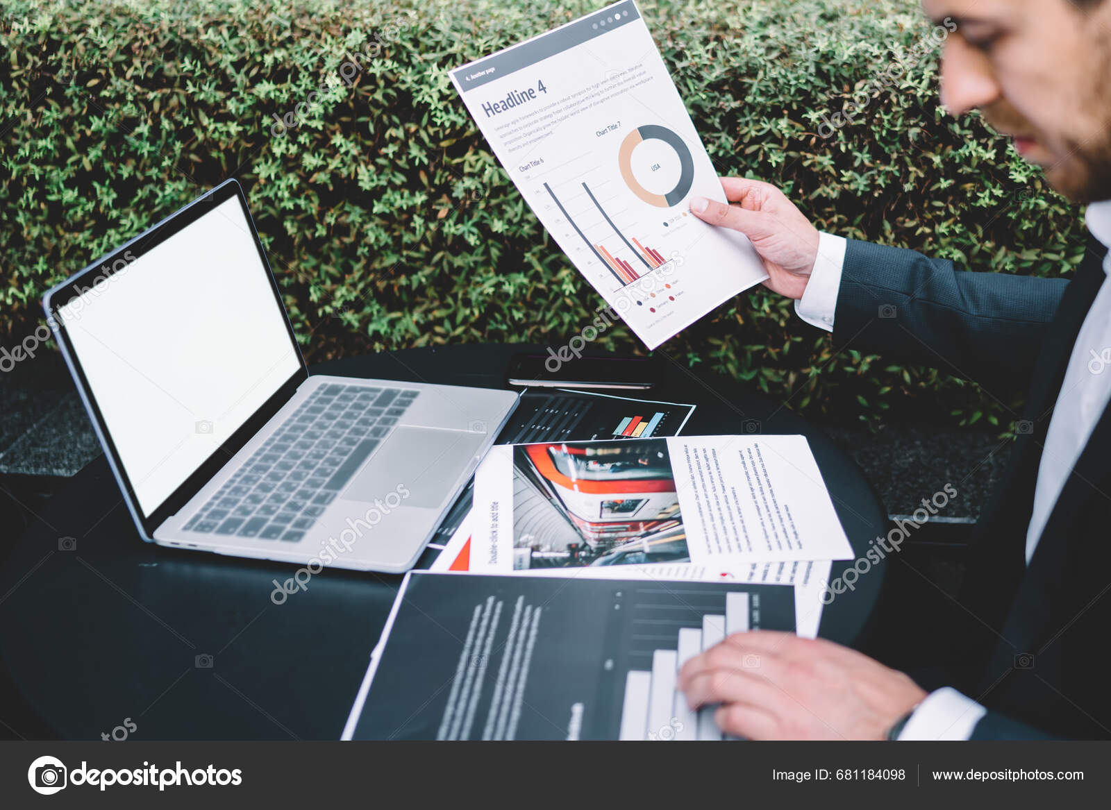 Side View Concentrated Employee Researching Paper Diagrams Work Laptop ...
