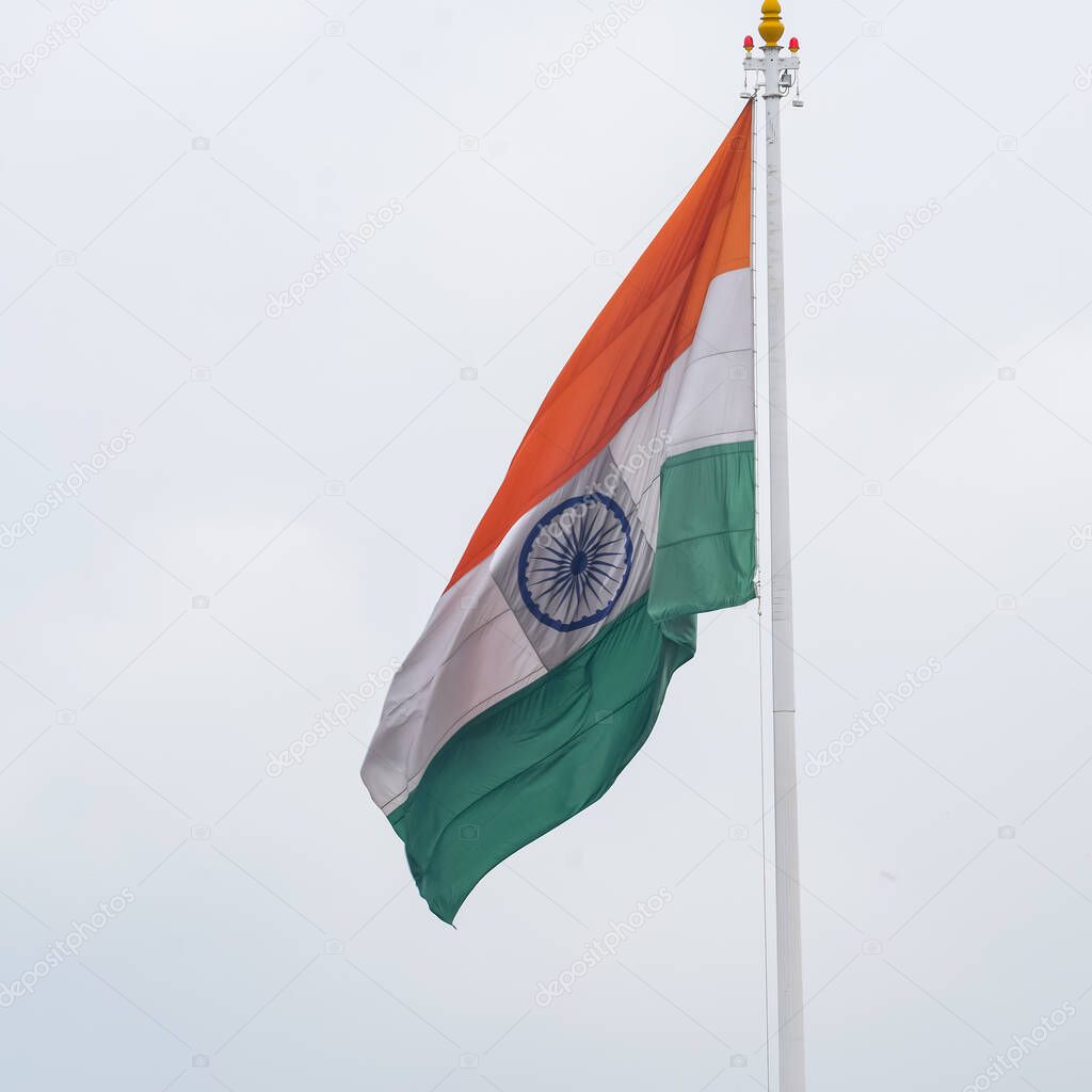 India flag flying high at Connaught Place with pride in blue sky, India ...