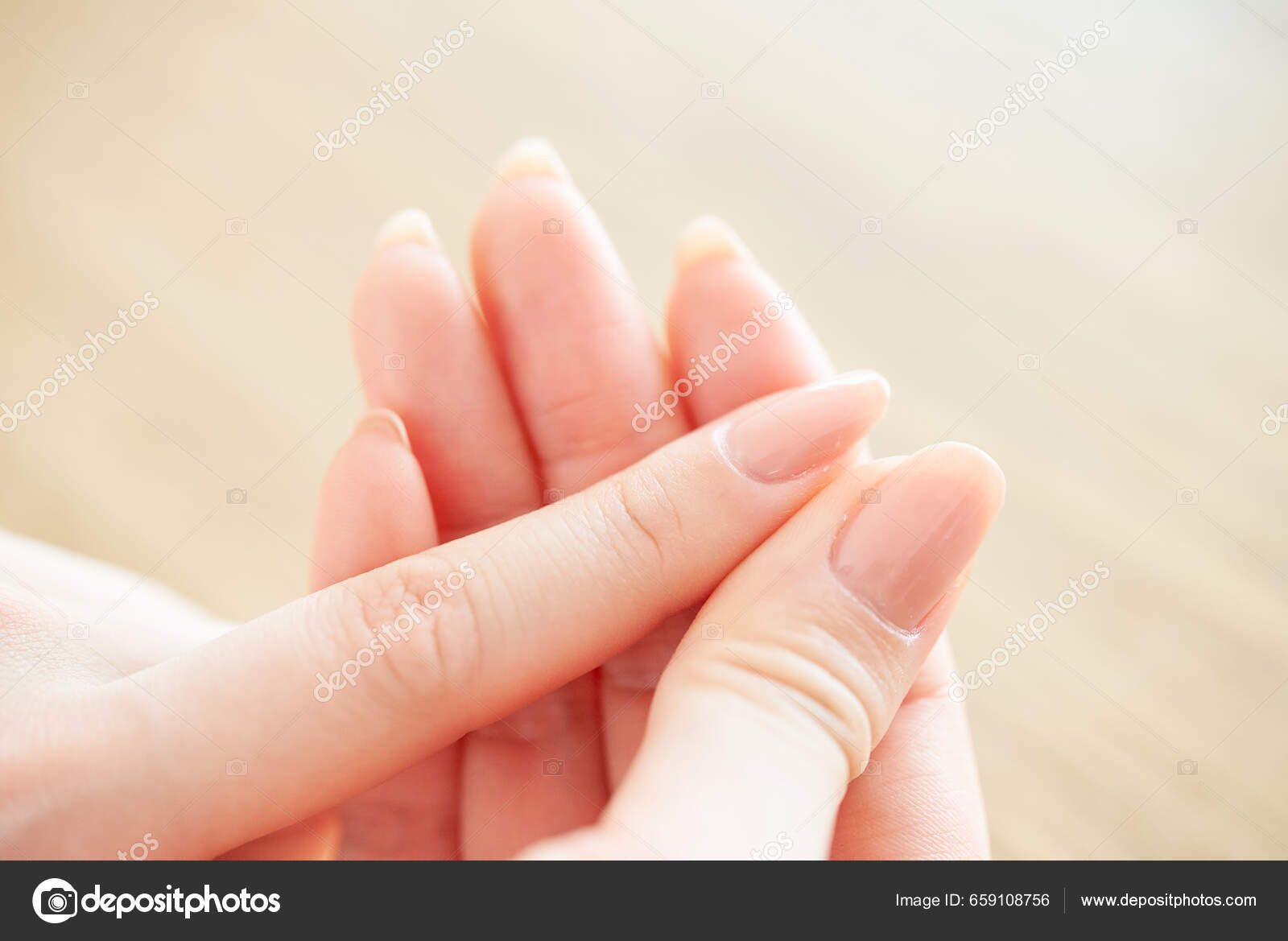 Woman's Hand Checking Condition Her Nails Stock Photo by ©marucco 659108756