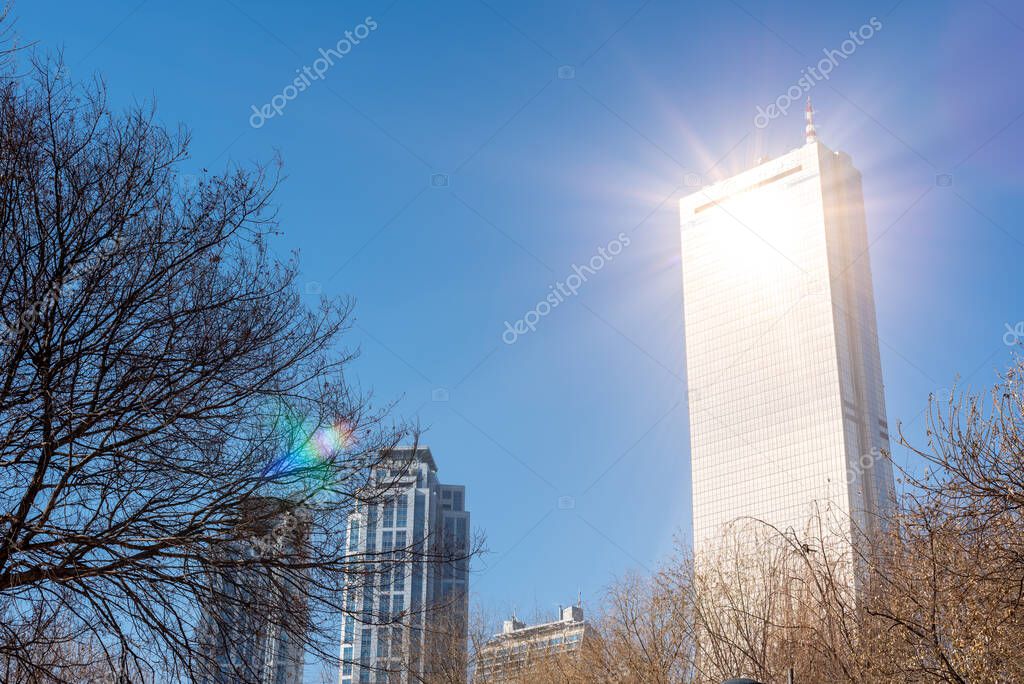 Sunlight reflecting from the gold-tinted glass of the 63 Square ...