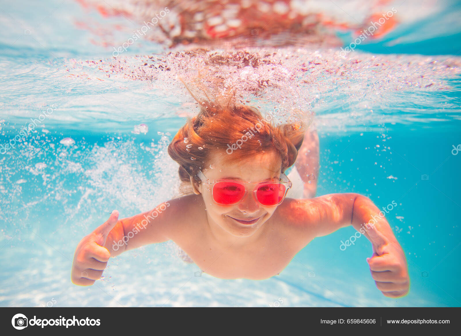 Kids Diving Into A Pool