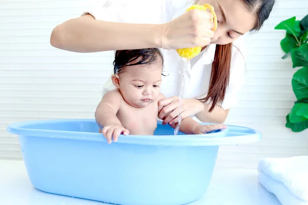 Baby asian bathing Stock Photos, Royalty Free Baby asian bathing Images ...