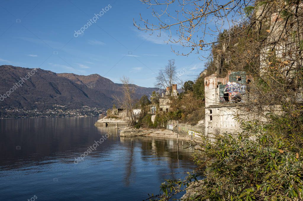 Castelveccana, Italy- 12-27-2022: Red brick chimneys and abandoned ...