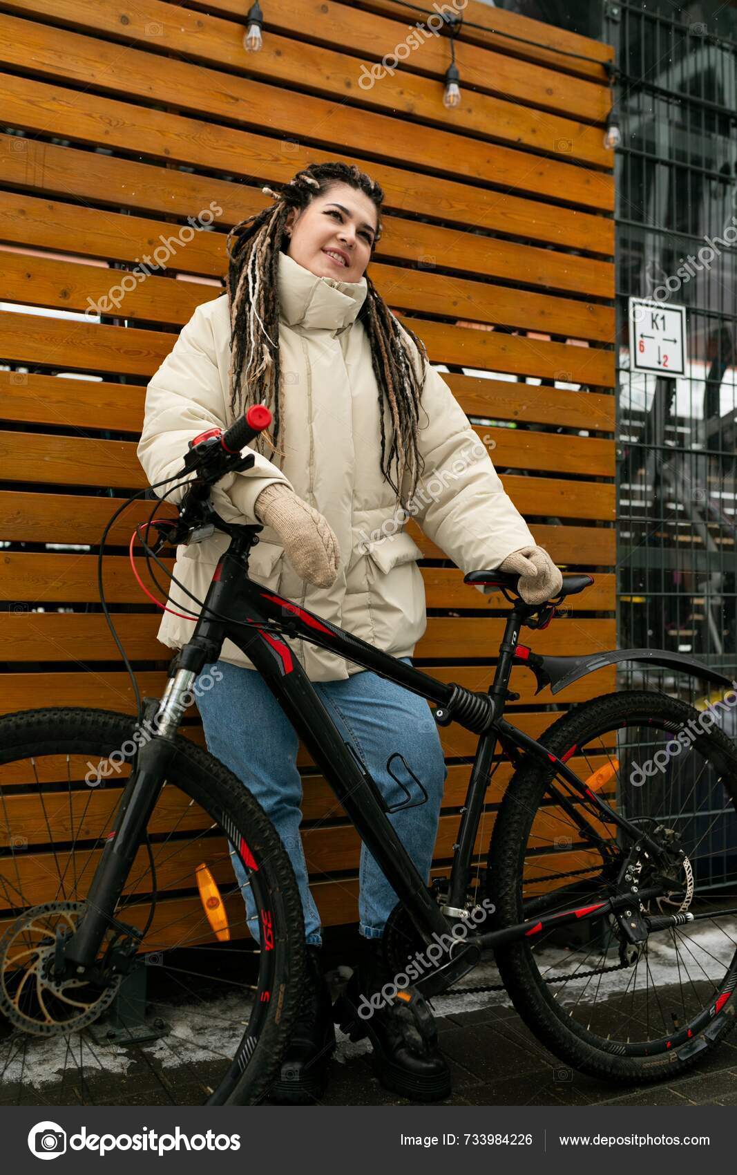 Woman Dreadlocks Seated Bicycle Her Hands Resting Handlebars She ...
